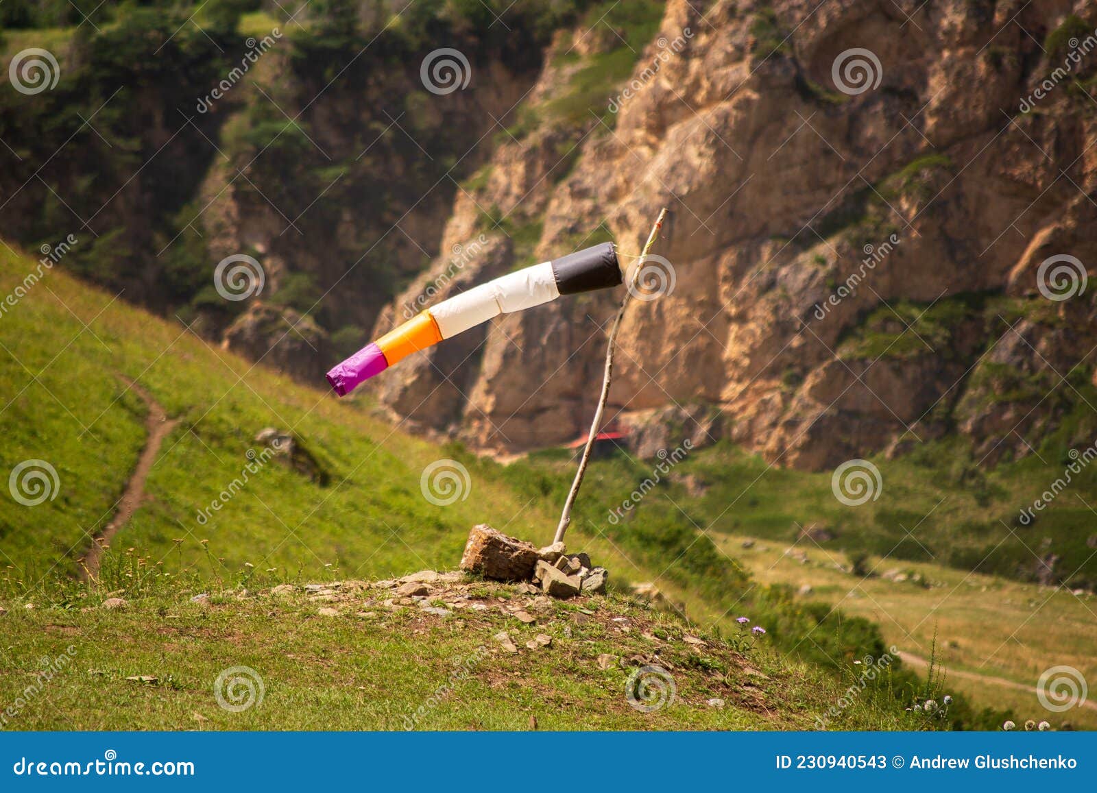 Multi-colored Windsail for Wind Direction in the Mountains Stock Image ...