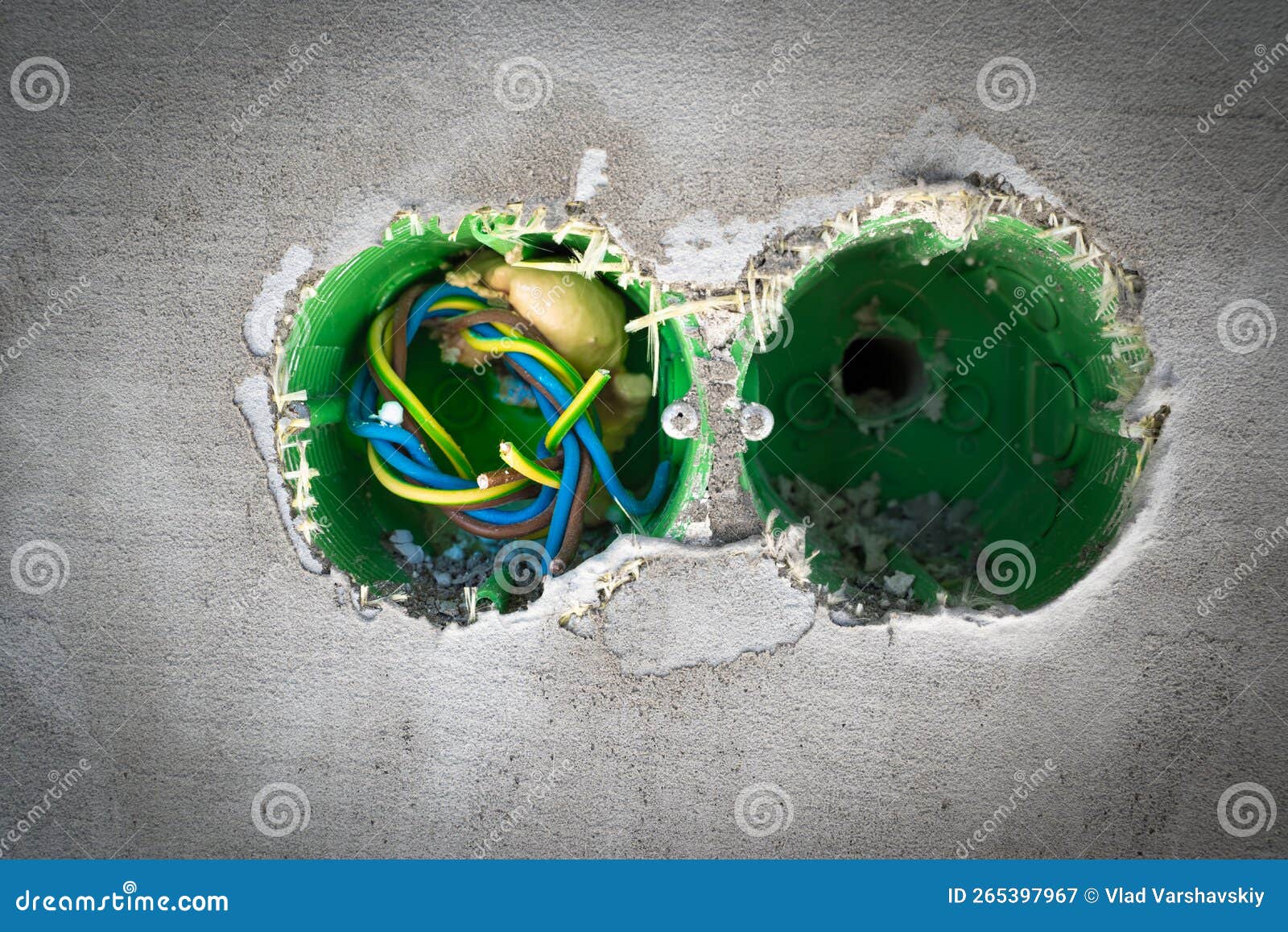 Multi-colored Wires in a Green Socket Under the Socket on the Facade of ...