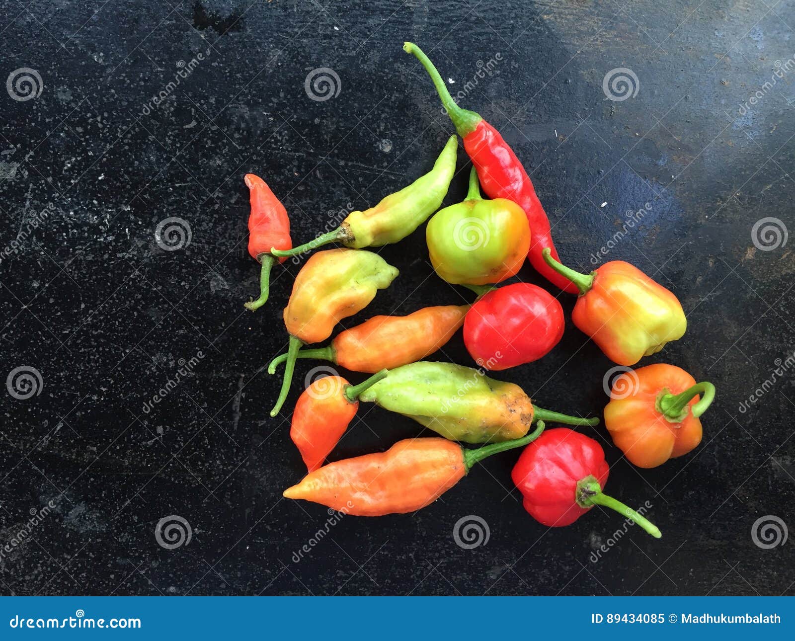 Multi Coloured Chillies in Black Background Stock Image - Image of ...