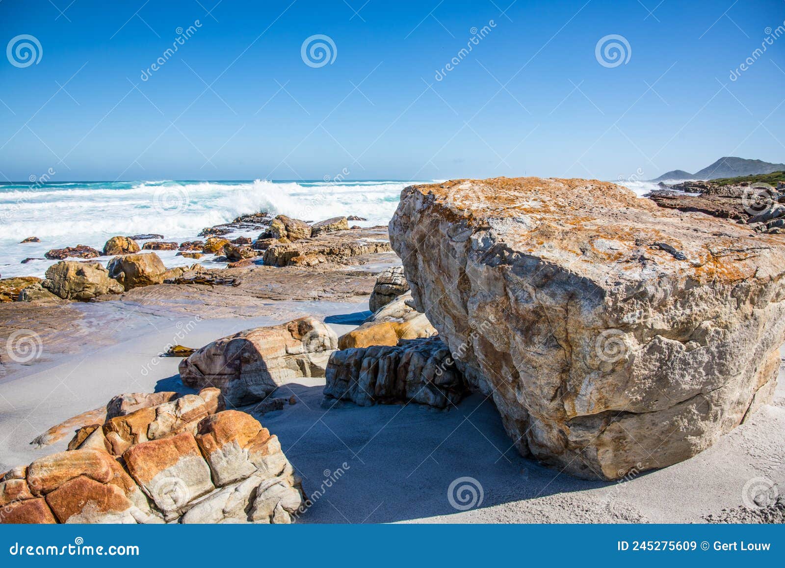 Multi Coloured and Interesting Shaped Rock on Beach Sand with Pathway ...