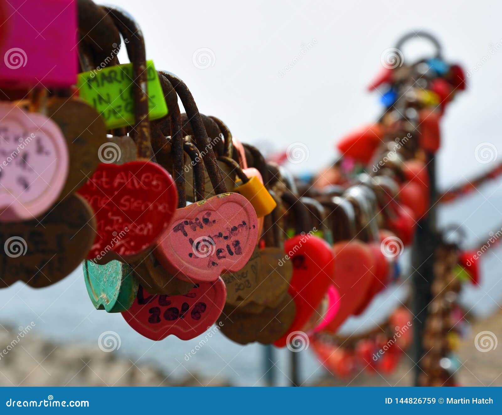 Multi Coloured Padlocks on Chain Fence Stock Image - Image of coloured ...