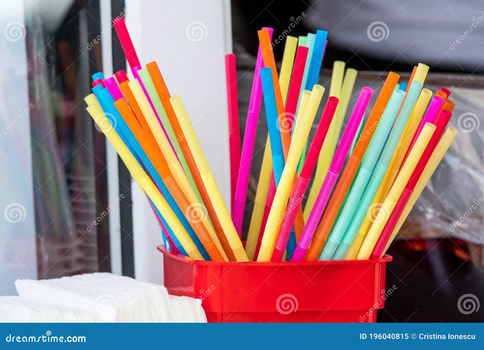 Multi Coloured Plastic Straws for Hot or Cold Drinks in Display at a ...