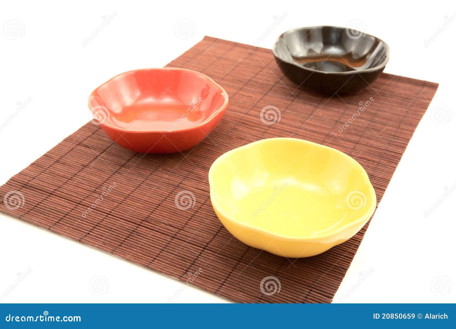 Multi-coloured Plates on a Napkin Stock Image - Image of brightly ...