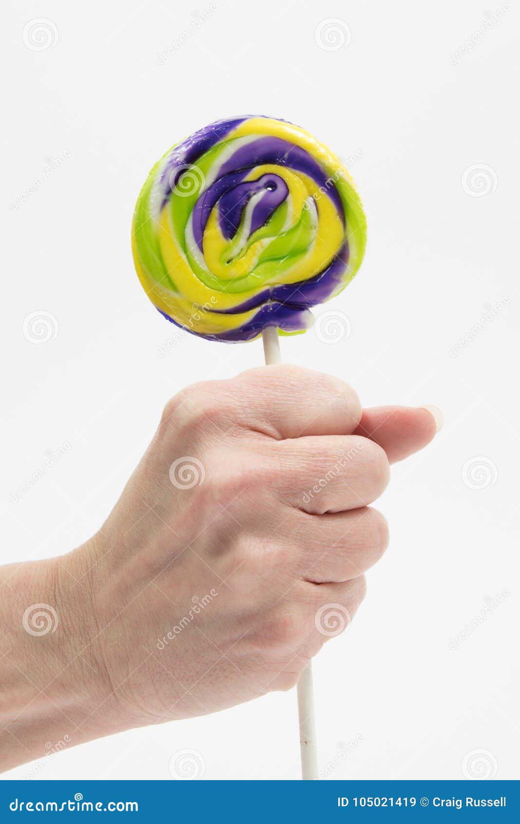 Multi Coloured Round Lollipop in Hand Stock Image - Image of confection ...