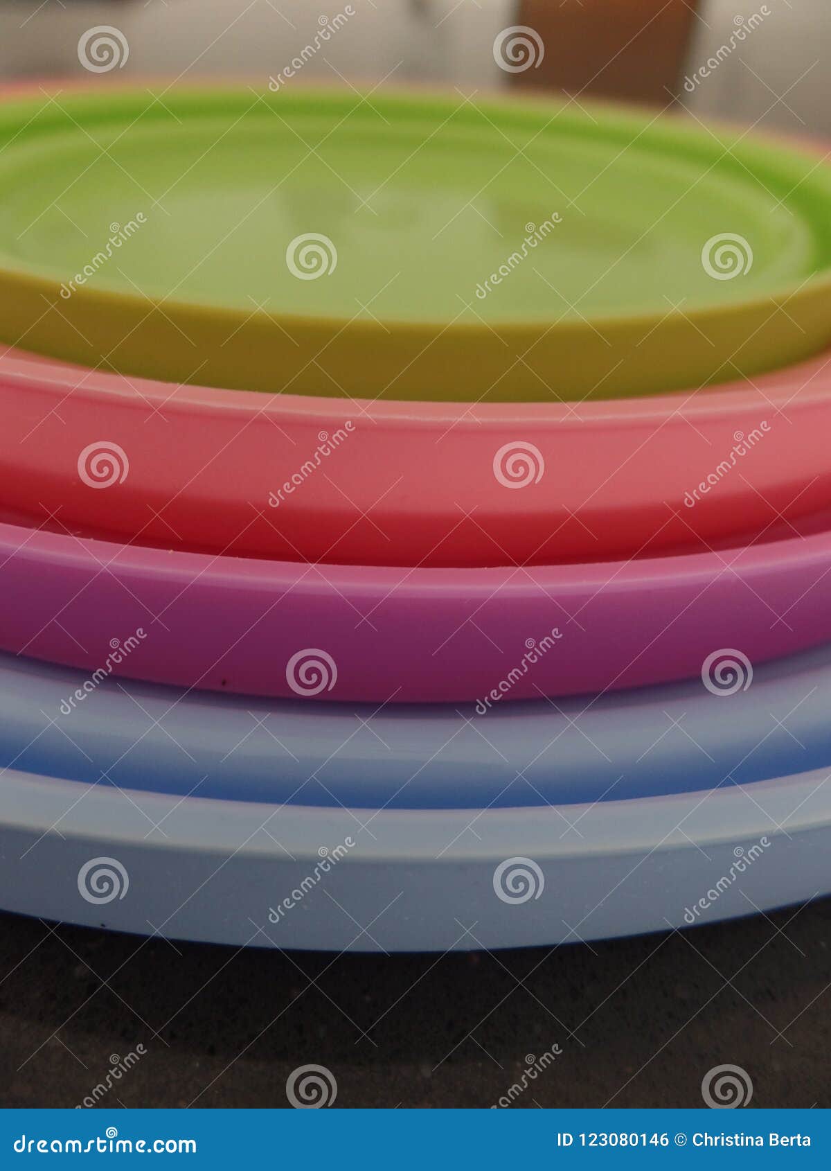 Multi Coloured Round Plastic Lids Stock Photo - Image of orderly ...