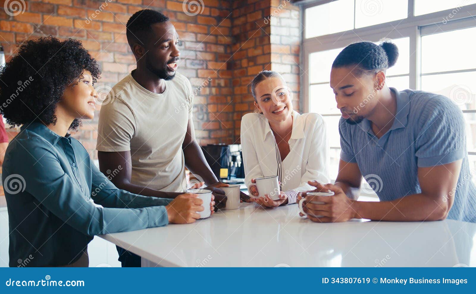 Multi-Cultural Businessmen Taking Coffee Break in Kitchen Area of ...
