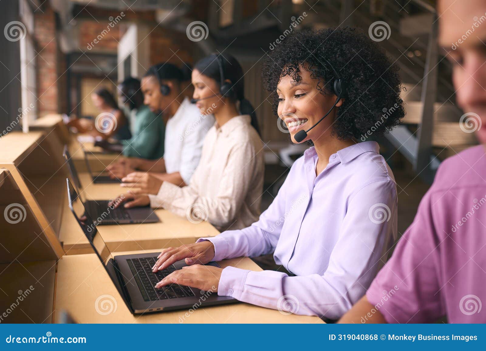 Multi-Cultural Customer Support or Telesales Team in Modern Open Plan ...