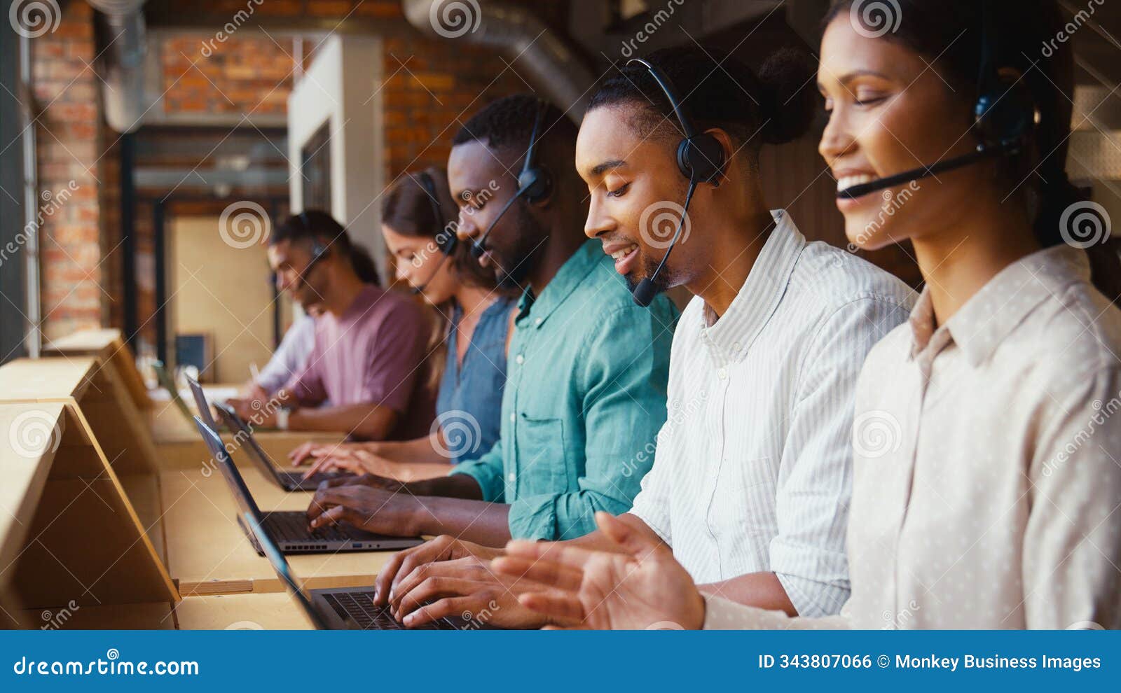 Multi-Cultural Customer Support or Telesales Team in Modern Open Plan ...