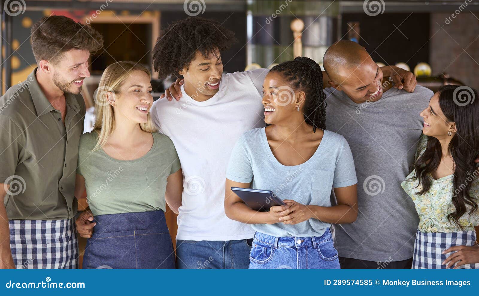 Multi-Cultural Staff Team with Digital Tablet Working in Restaurant or ...