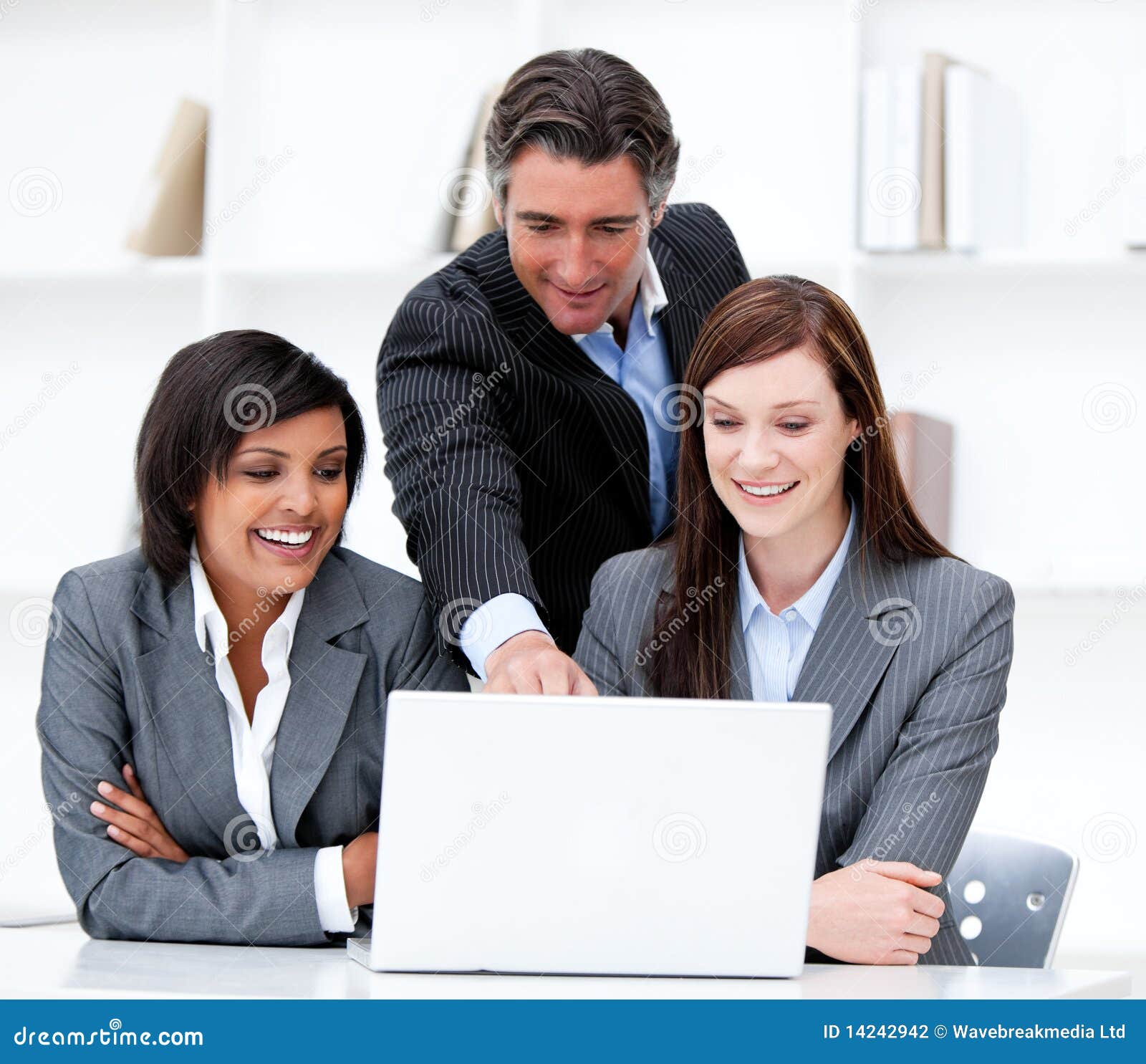 Multi-ethnic Business Team Working at a Computer Stock Photo - Image of ...