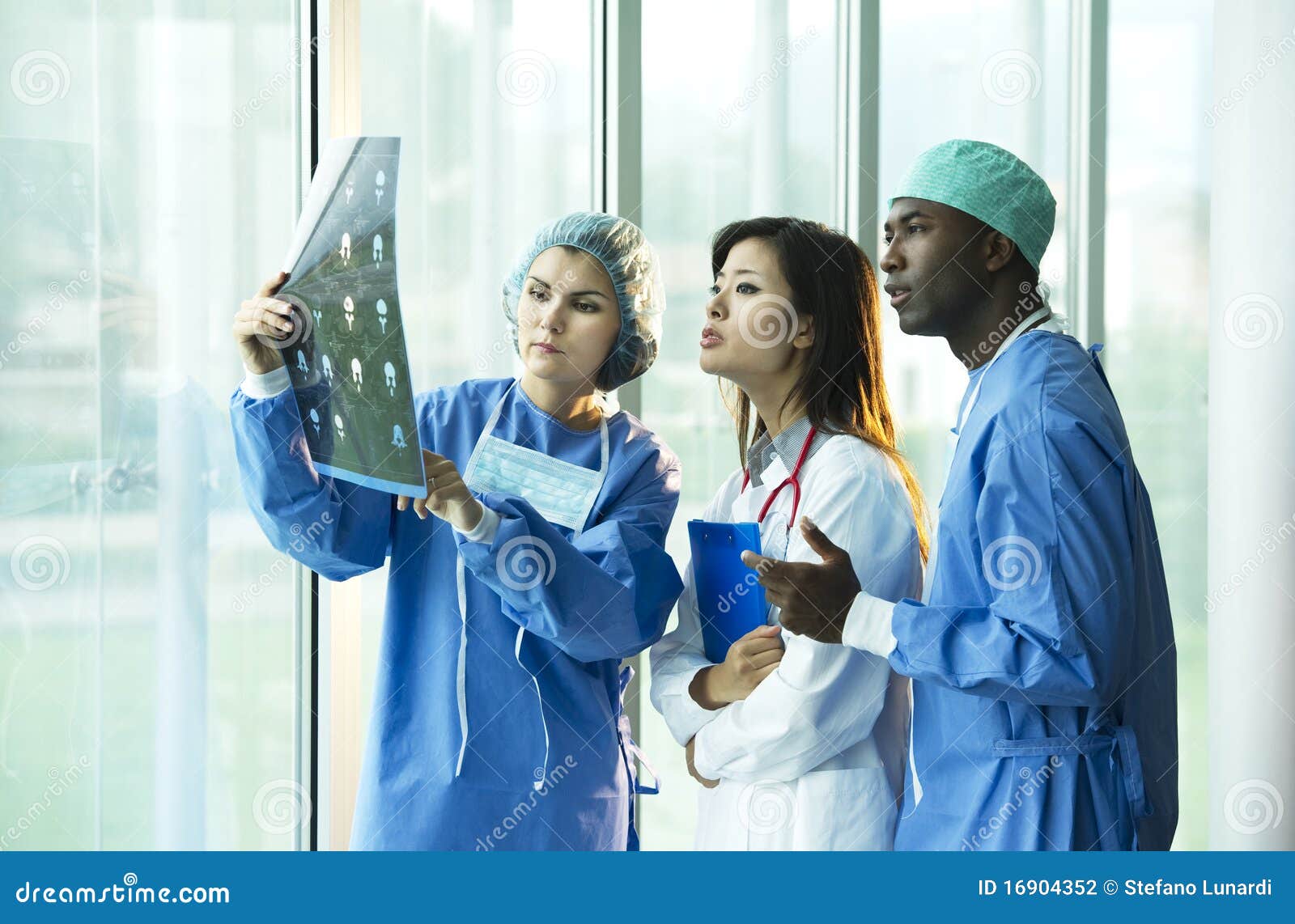 Multi-ethnic Doctors Consulting Stock Photo - Image of labcoat ...