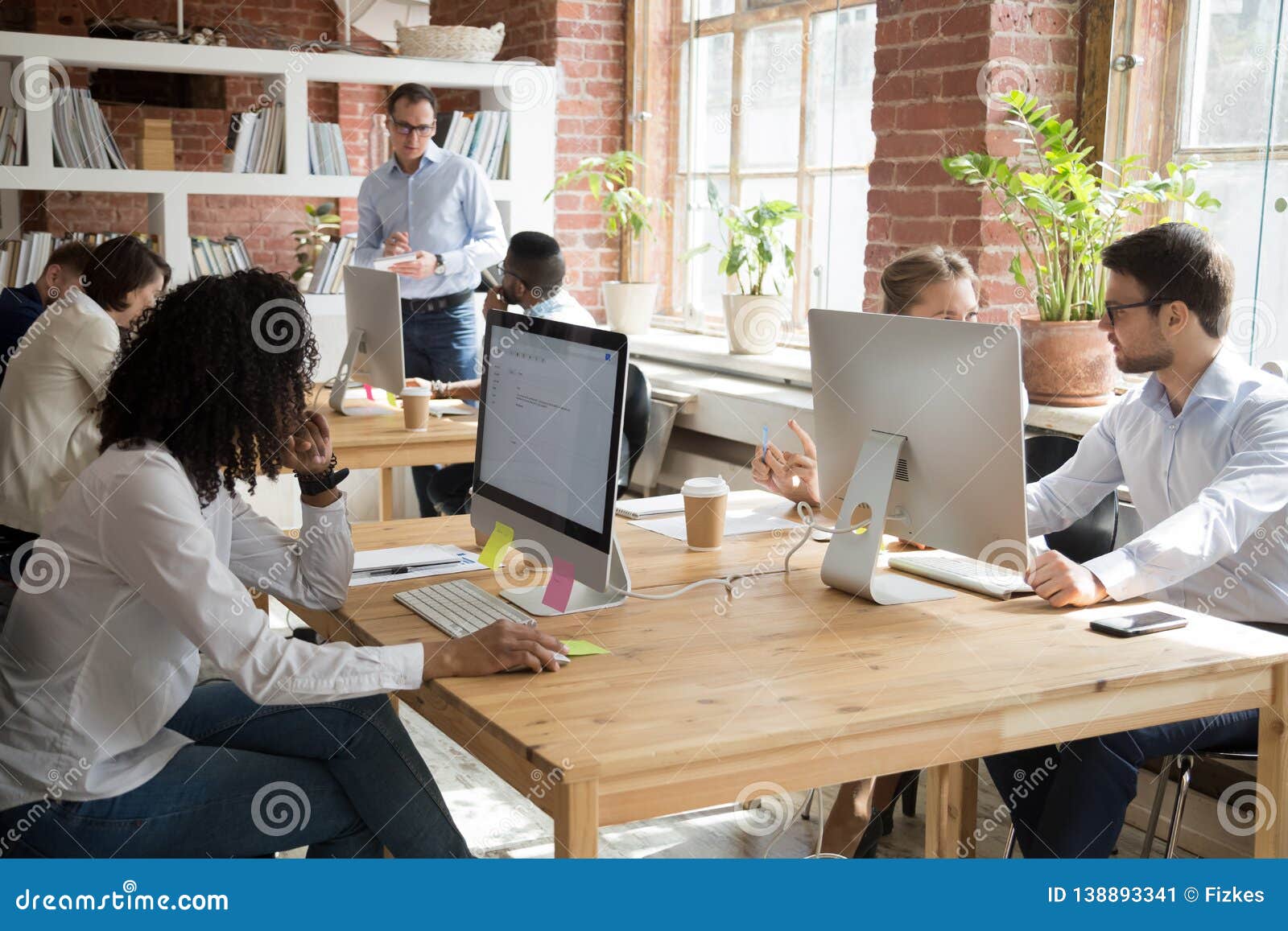 Multi Ethnic Employees Working On Computers In Modern Office Room Stock Image Image Of
