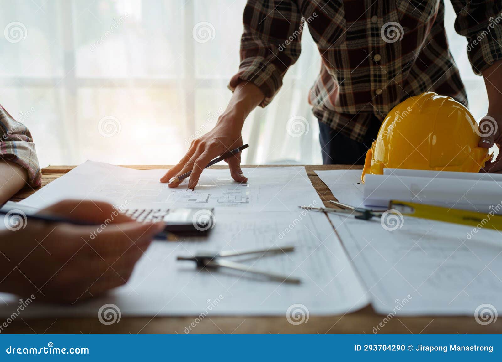 Multi Ethnic Engineer Brainstorming and Measuring for Cost Estimating ...