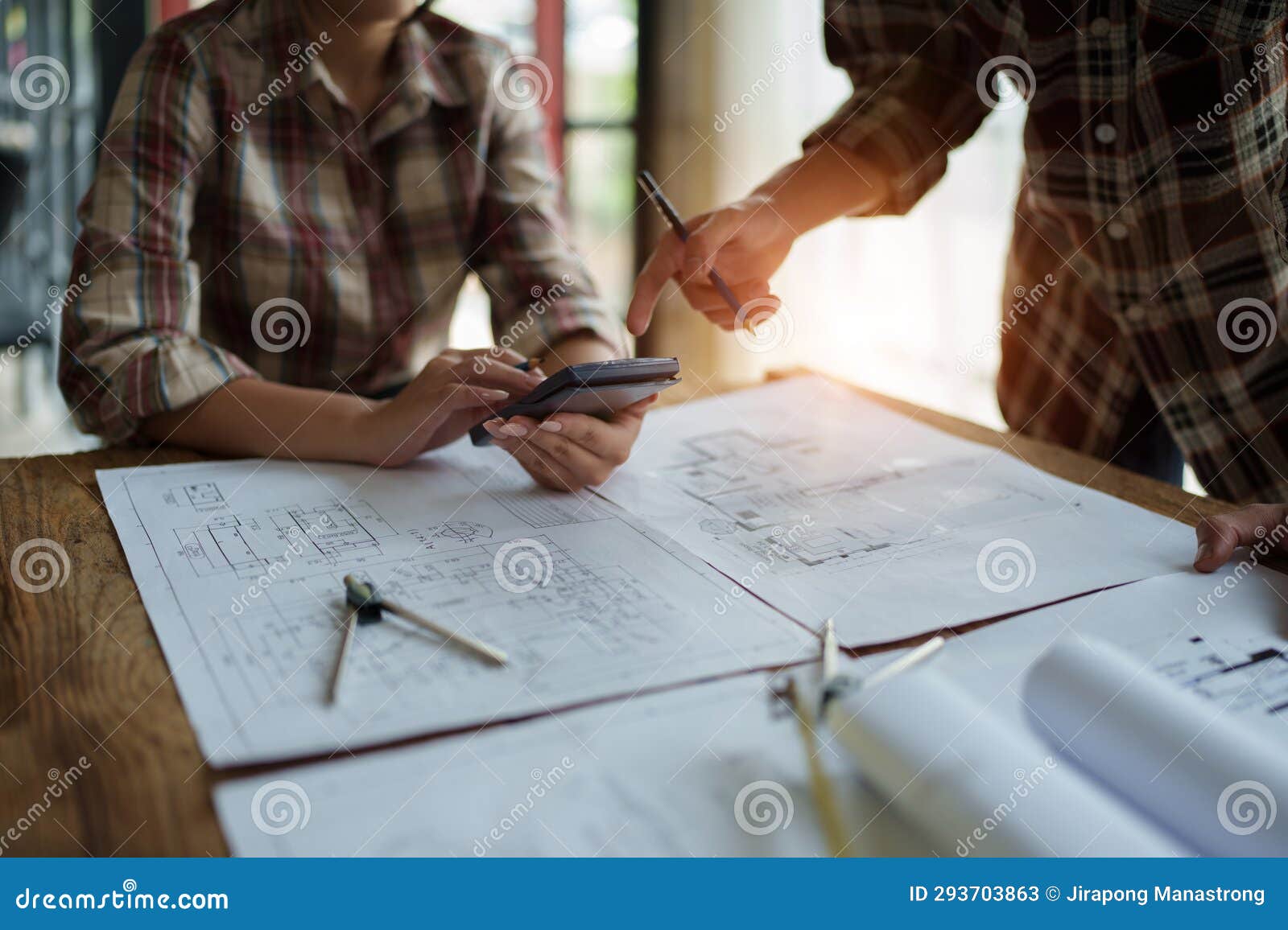 Multi Ethnic Engineer Brainstorming and Measuring for Cost Estimating ...