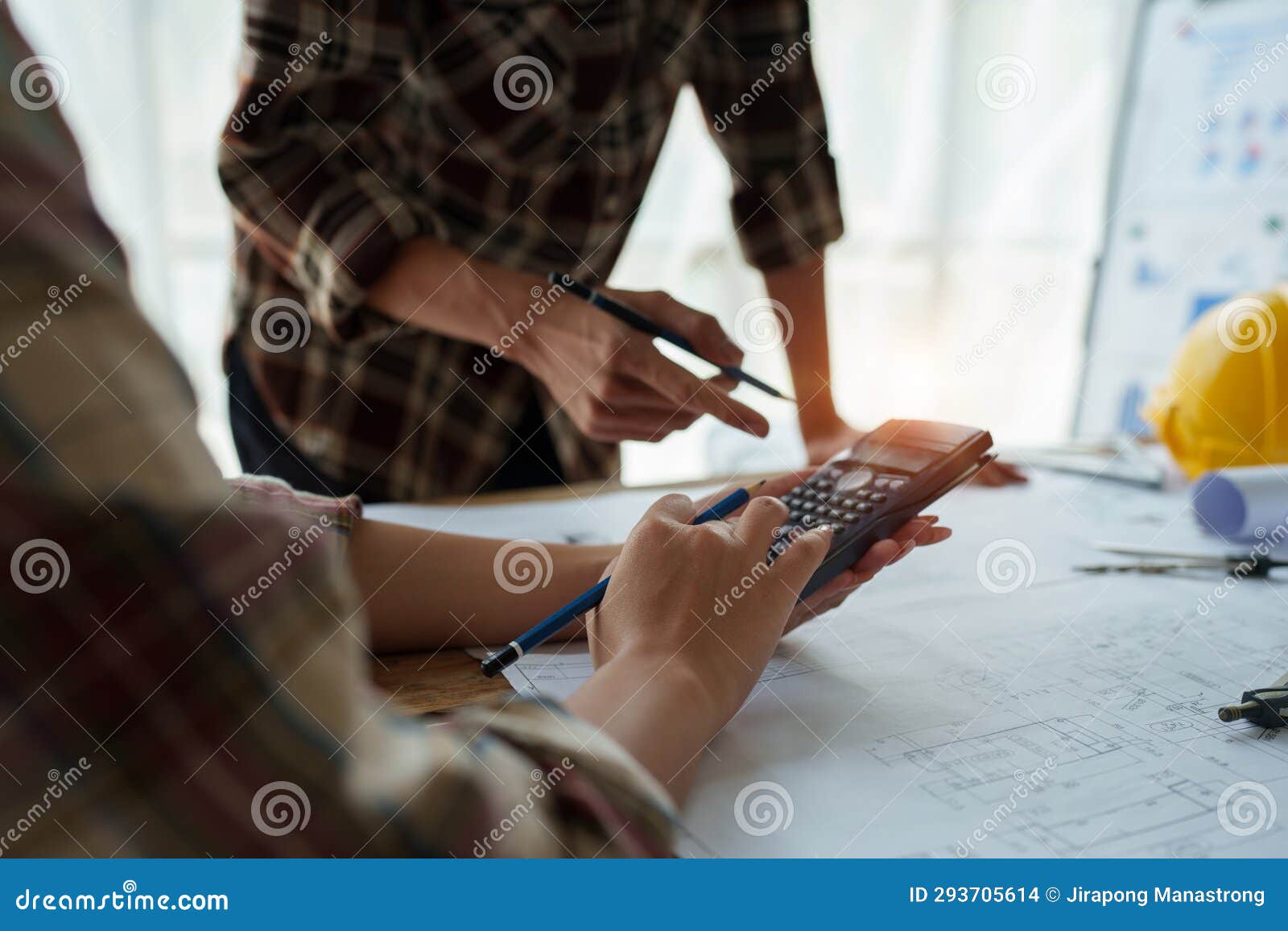 Multi Ethnic Engineer Brainstorming and Measuring for Cost Estimating ...