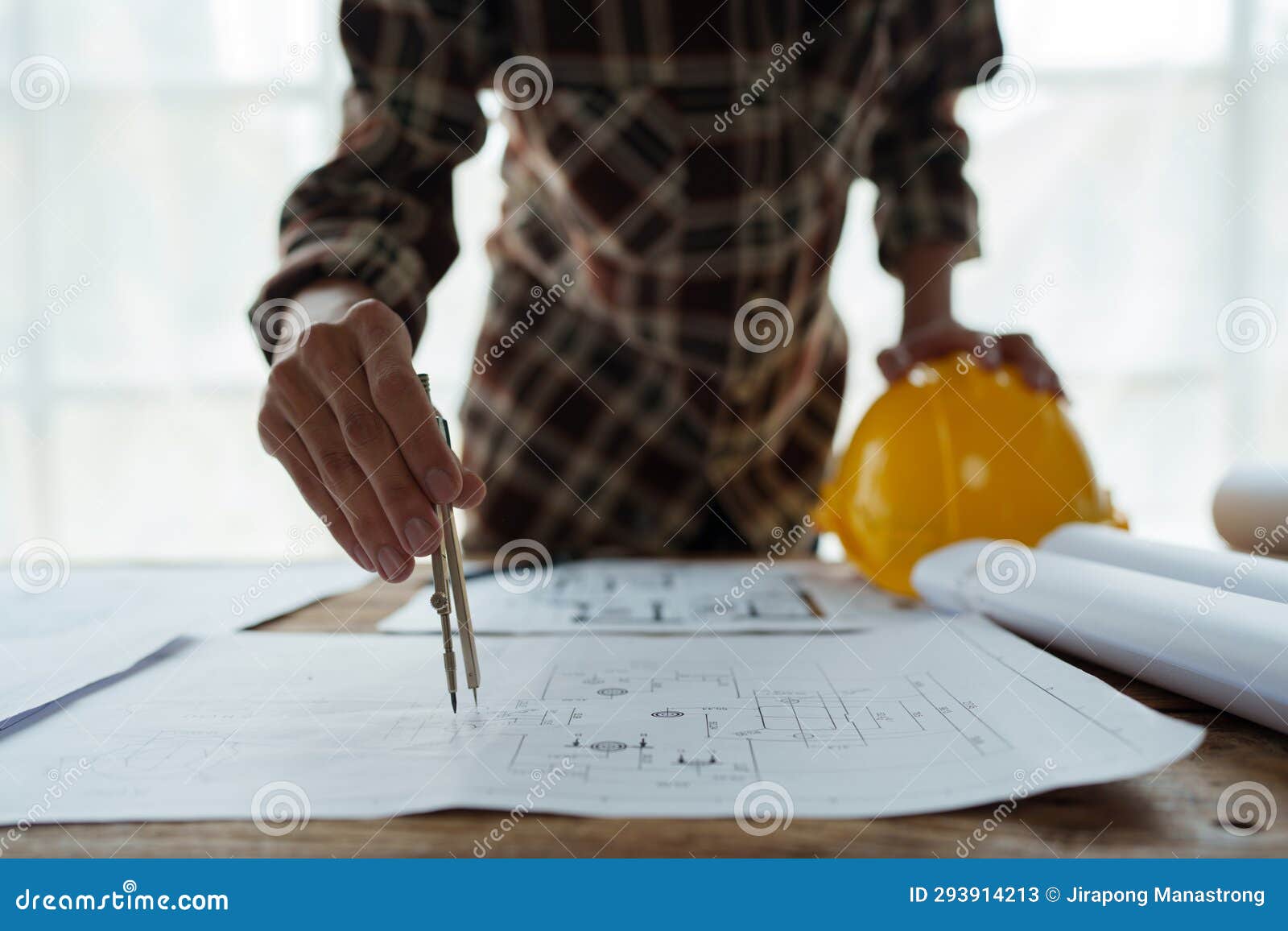 Multi Ethnic Engineer Brainstorming and Measuring for Cost Estimating ...