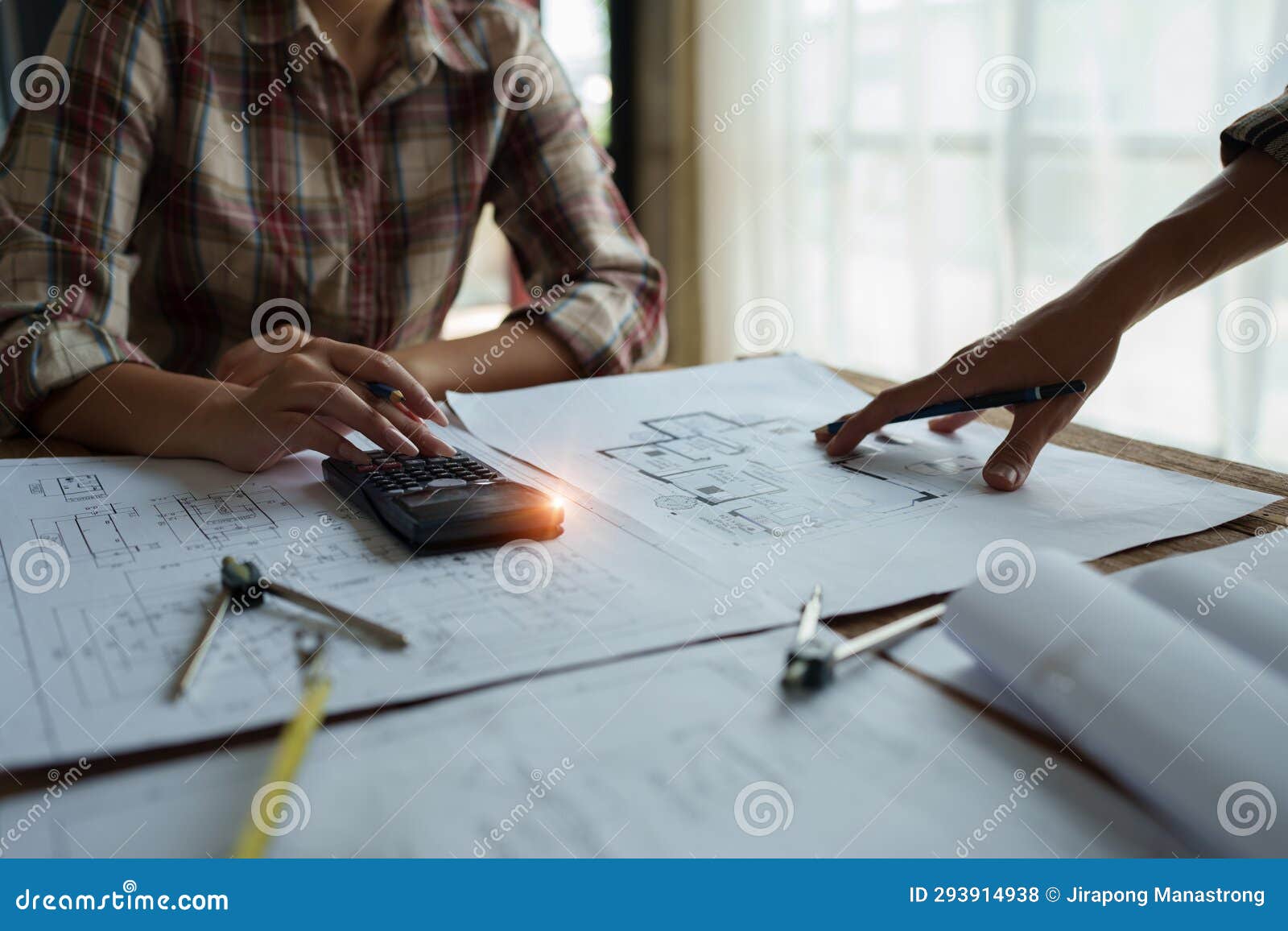 Multi Ethnic Engineer Brainstorming and Measuring for Cost Estimating ...
