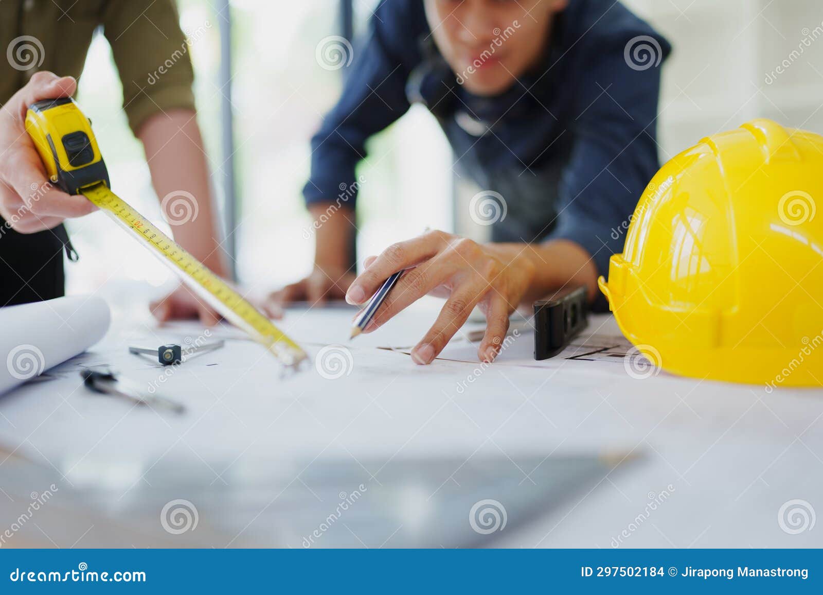 Multi Ethnic Engineer Brainstorming and Measuring for Cost Estimating ...