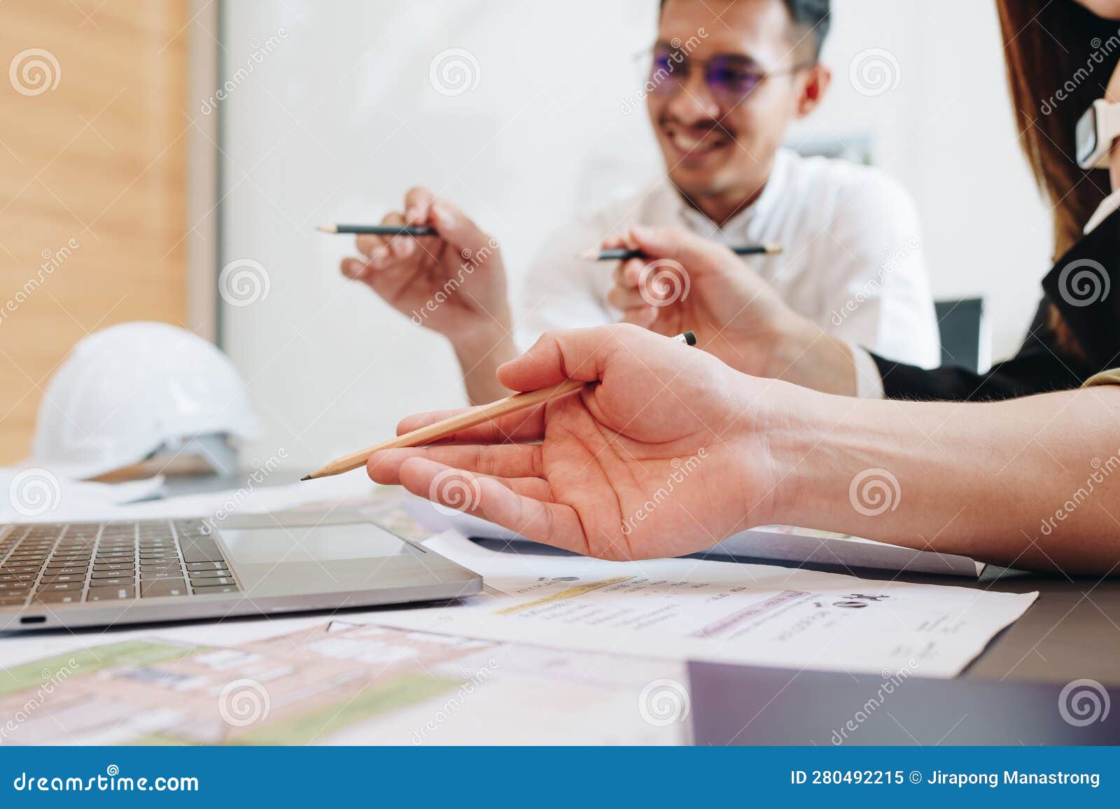 Multi Ethnic Engineer Brainstorming and Measuring for Cost Estimating ...