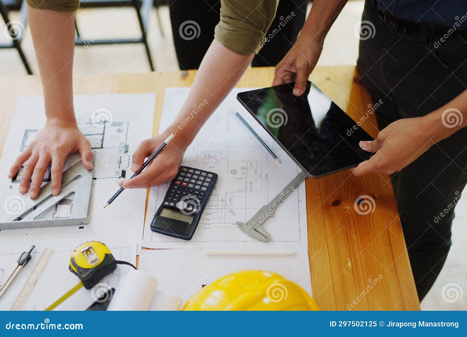 Multi Ethnic Engineer Brainstorming and Measuring for Cost Estimating ...