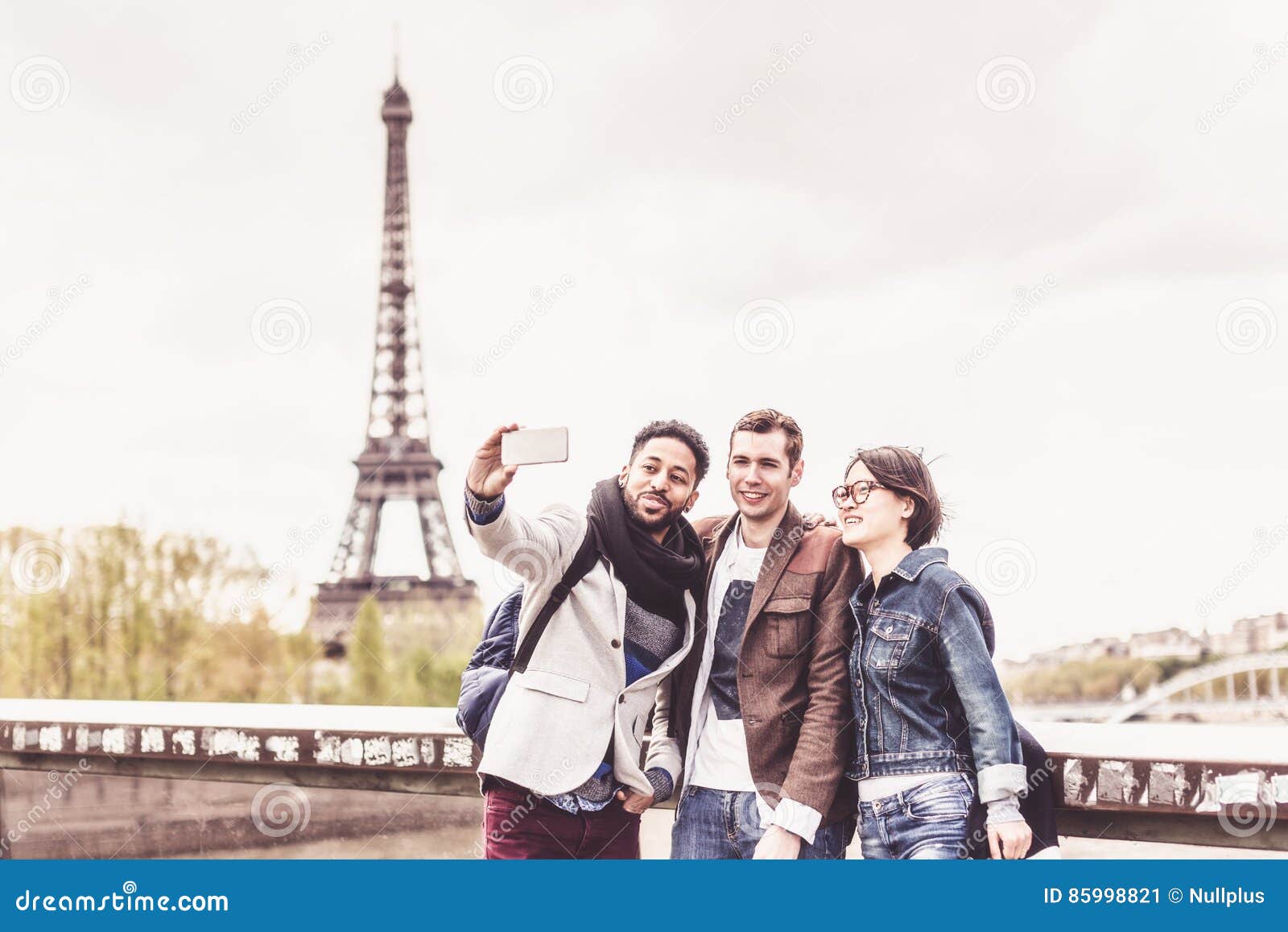 Multi-ethnic Group of Friends Having Fun in Paris Along Seine Stock ...