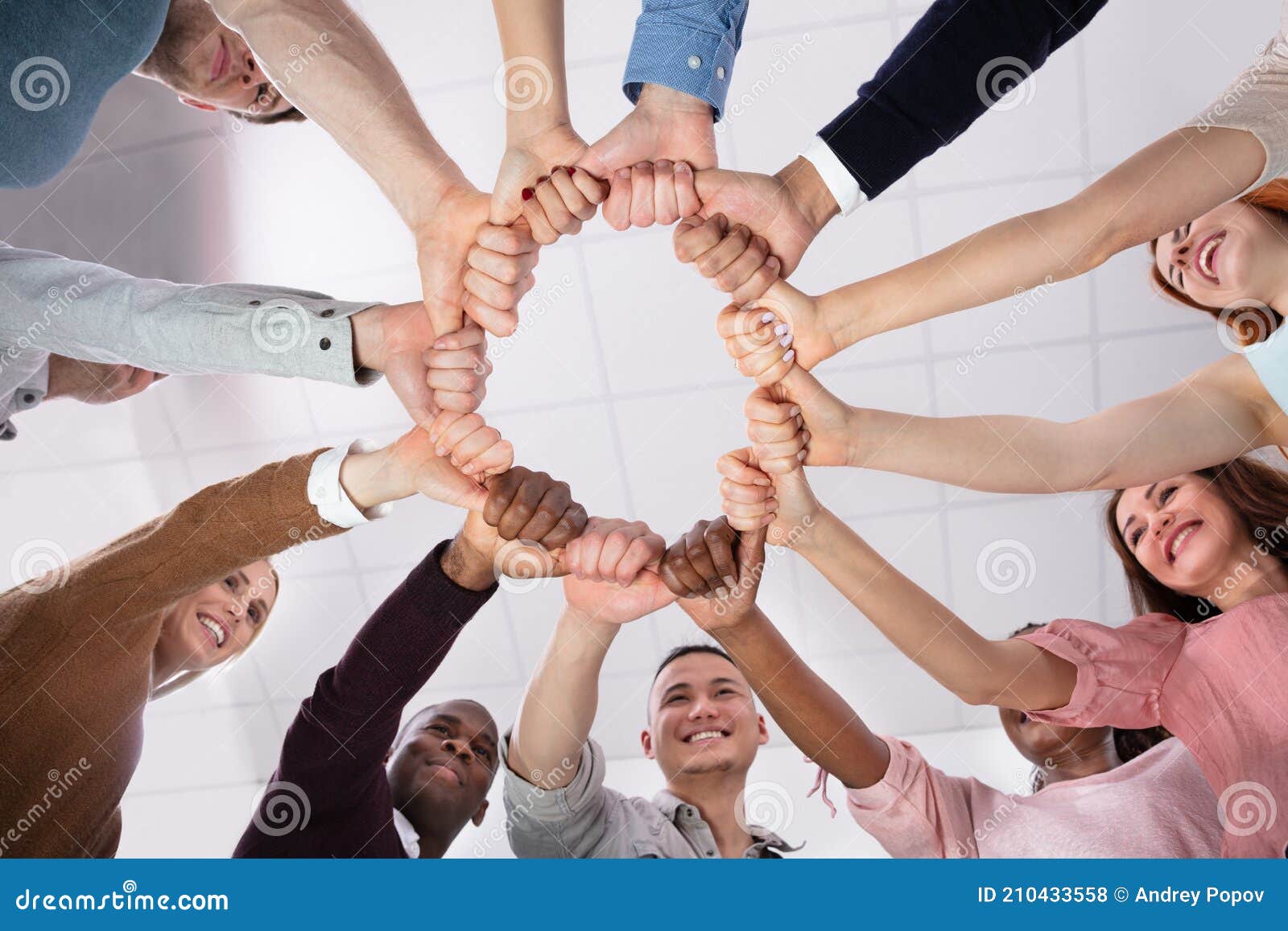 Low Angle View of People Making Circle with Their Hands Stock Photo ...
