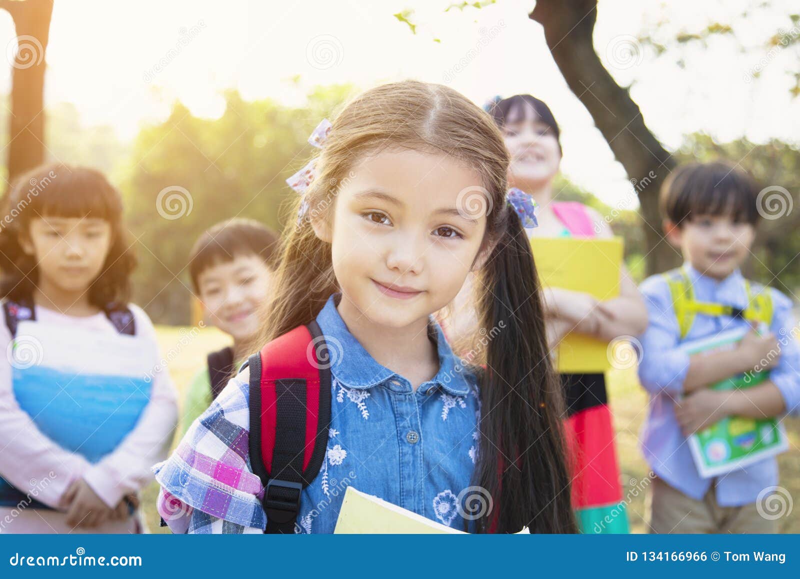 Multi-ethnic Group of Schoolchildren in Park Stock Photo - Image of ... Multi-ethnic Group of Schoolchildren in Park Stock Photo - Image of ...
