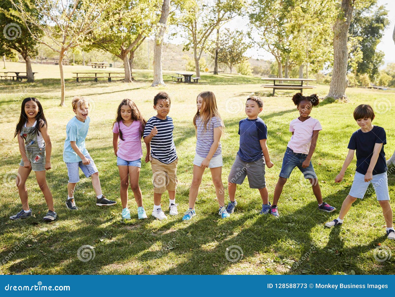Multi-ethnic Group of Schoolchildren Playing in Park Stock Image ... Multi-ethnic Group of Schoolchildren Playing in Park Stock Image ...