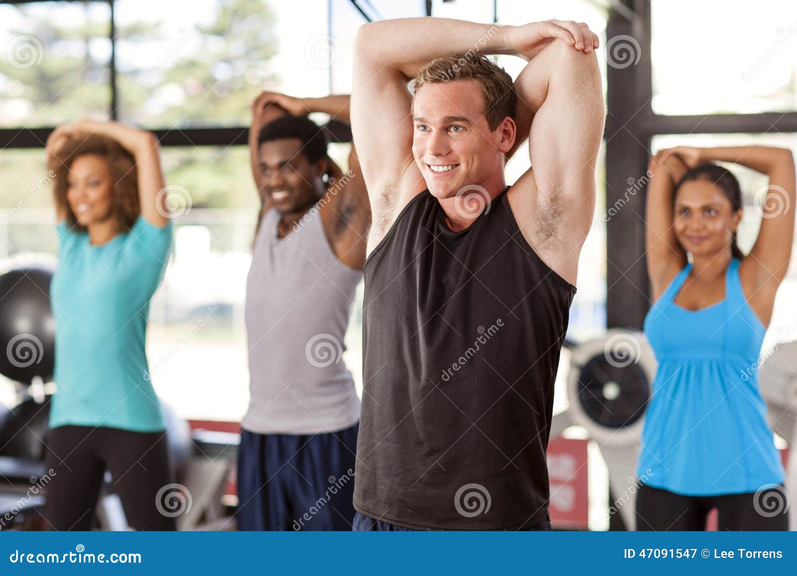 Multi-ethnic Group Stretching in a Gym Stock Image - Image of muscle ...