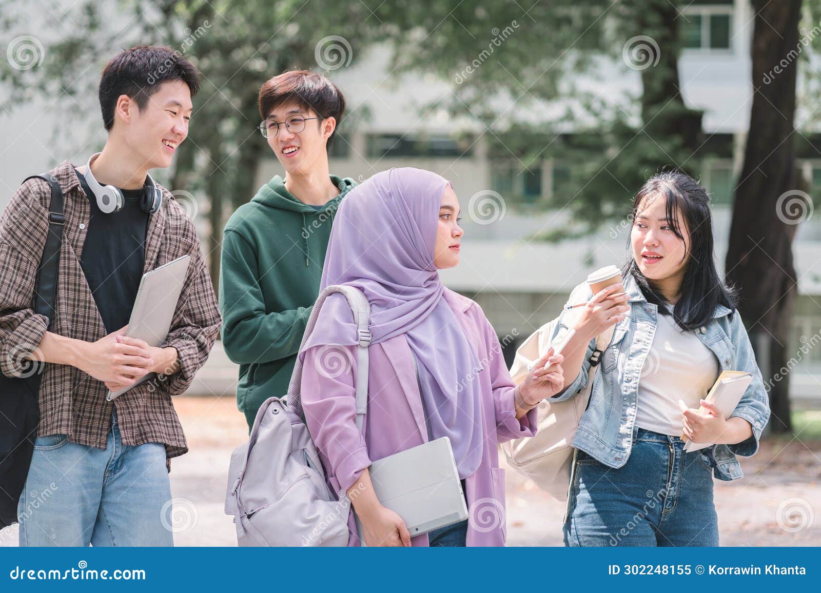 Multi Ethnic Group of University Students Walks and Talks Together ...