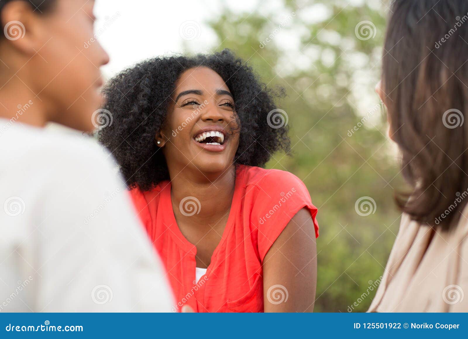 Multi-ethnic Group of Women Laughing and Talking. Stock Photo - Image ...