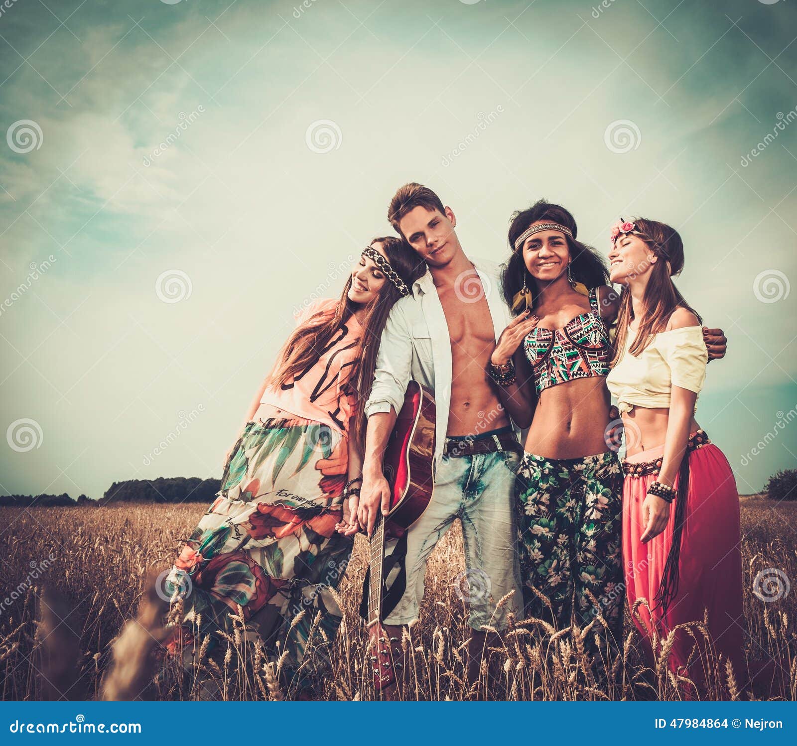 Multi-ethnic Hippie Friends in a Wheat Field Stock Photo - Image of ...