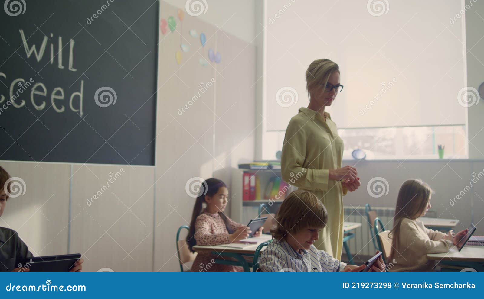 Teacher Looking Students at Lesson. Children Learning with Digital ...
