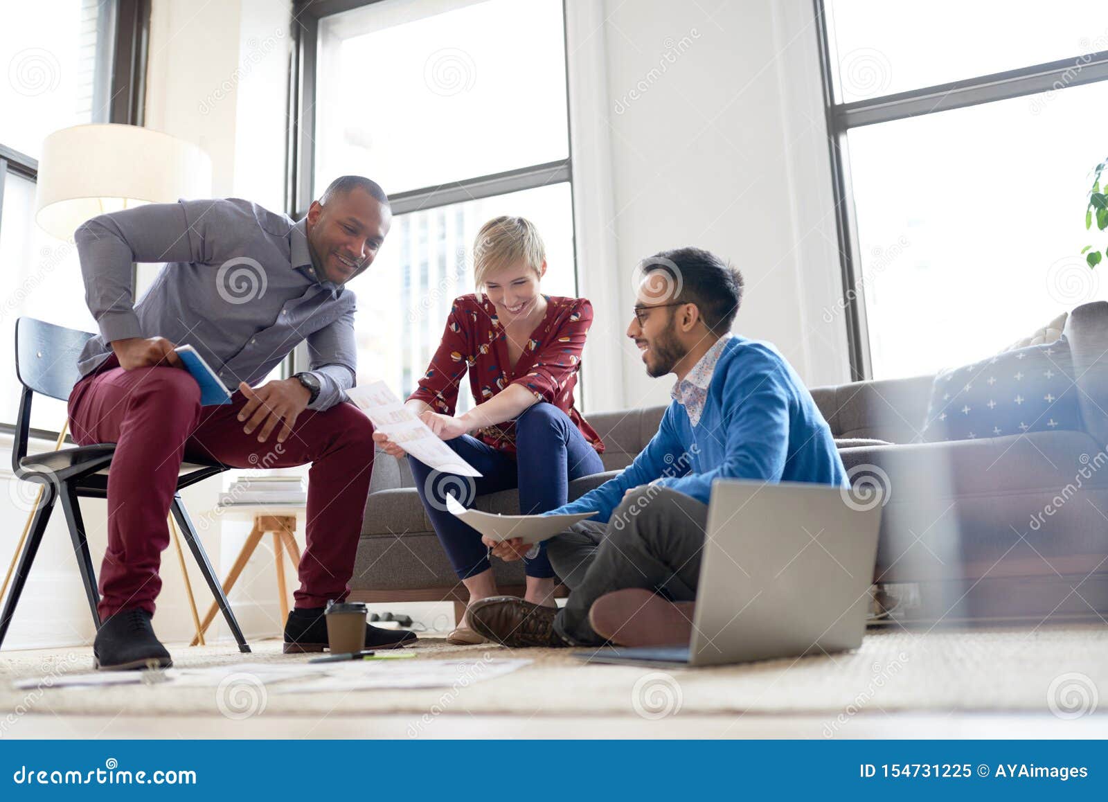 Multi-ethnic Team of Creative Millenials Collaborating on a Brainstorm ...