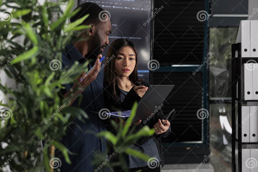 Multi Ethnic Team of System Developers Analyzing Html Code Stock Photo - Image of online, script ...