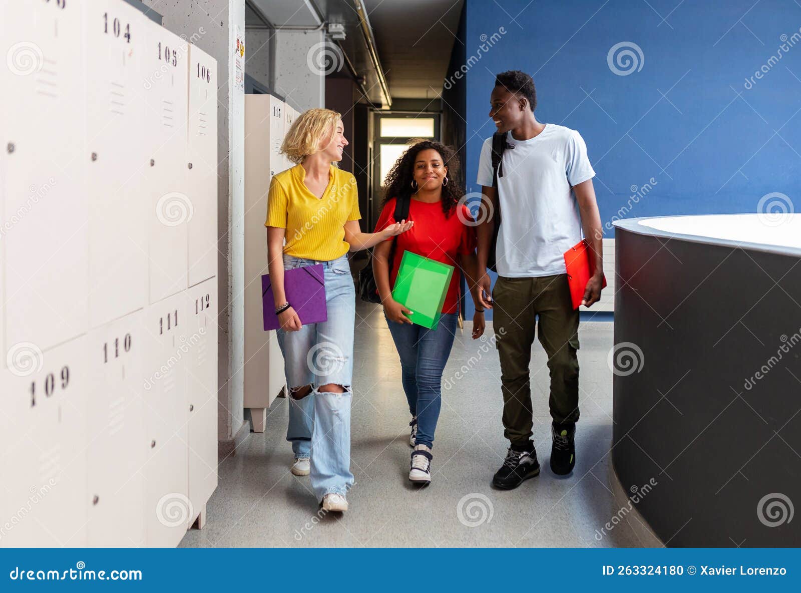 Multi-ethnic Young Group of Students Talking after Classes at High ...