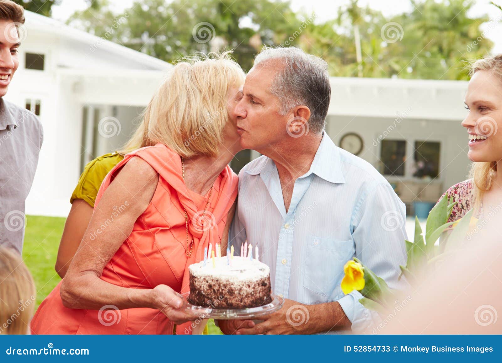 Multi Generation Family Celebrating Birthday in Garden Stock Image ...