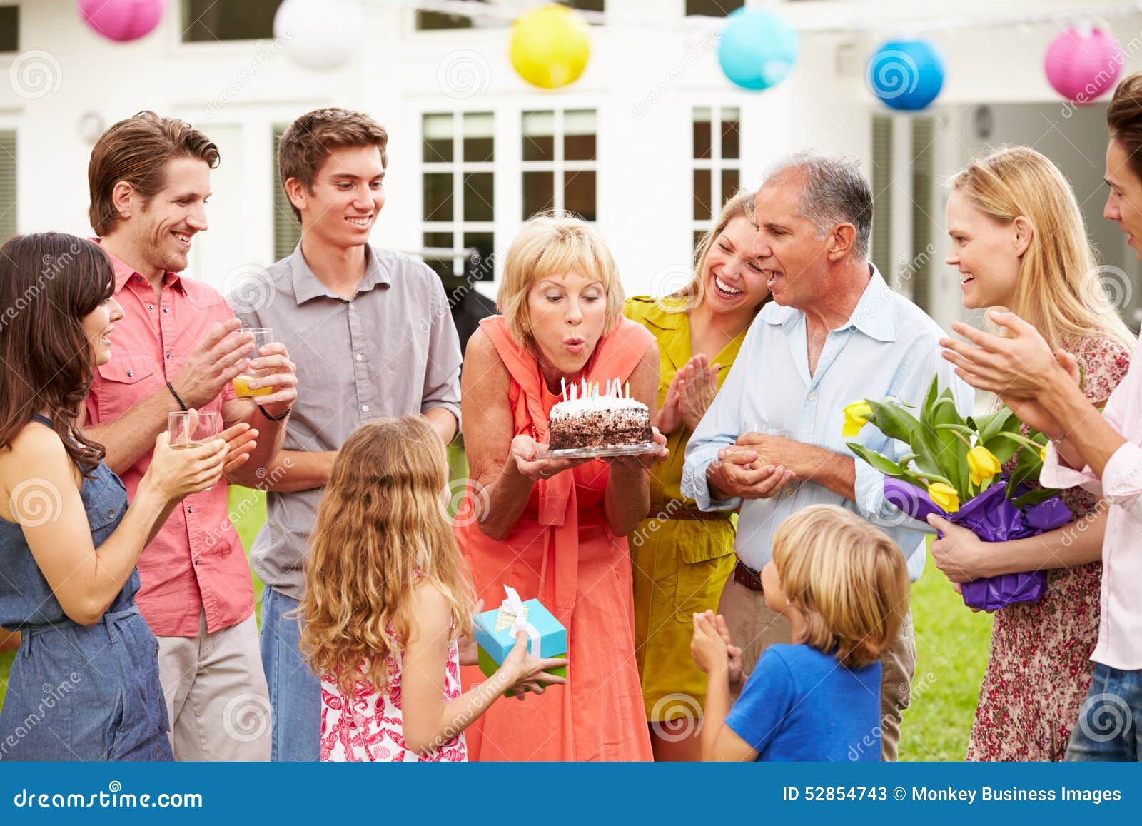 Multi Generation Family Celebrating Birthday in Garden Stock Image ...