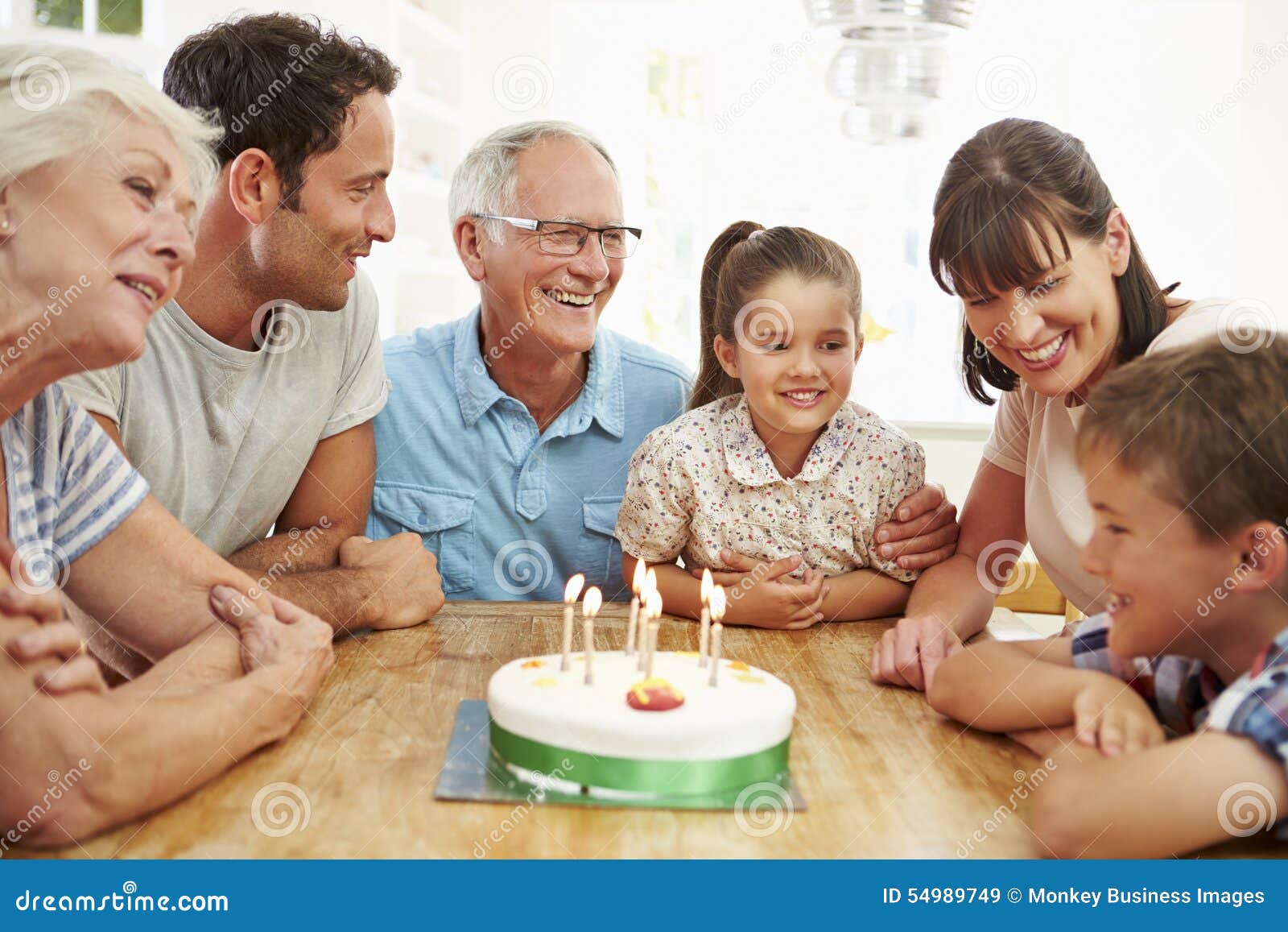 Multi Generation Family Celebrating Son S Birthday Stock Image - Image ...