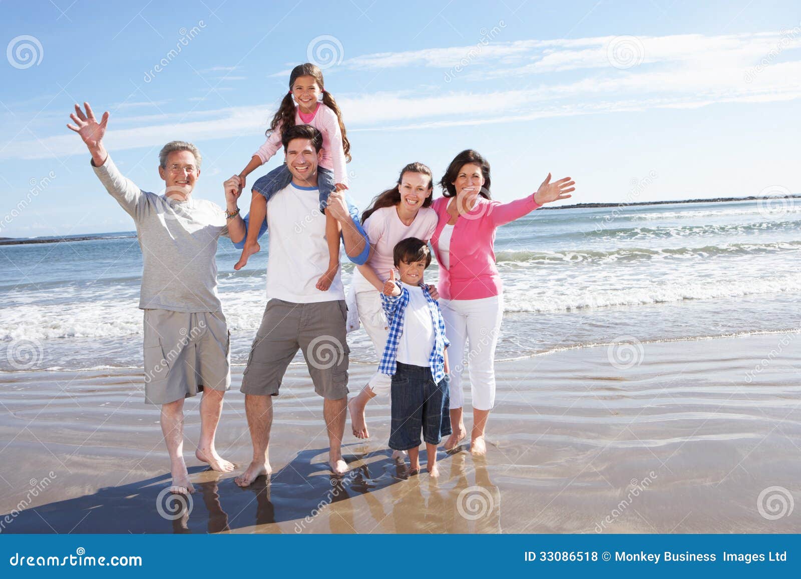 Multi Generation Family Having Fun on Beach Holiday Stock Photo - Image ...