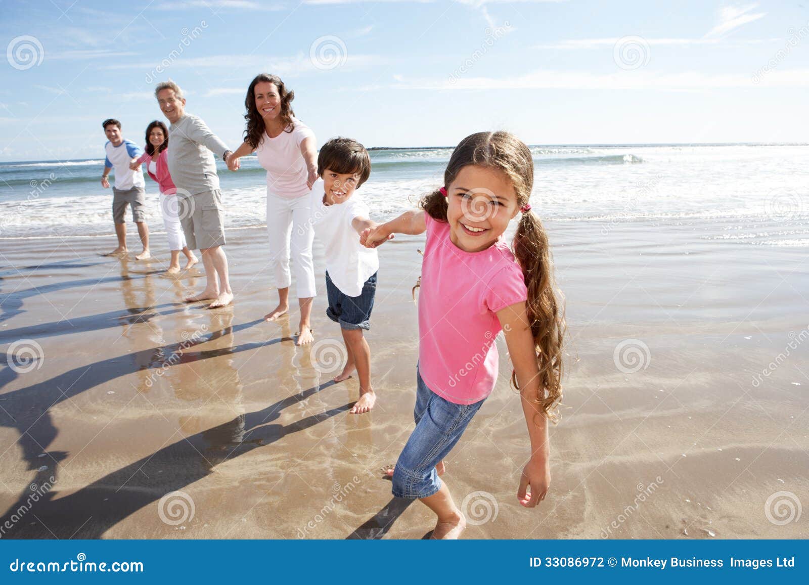 Multi Generation Family Having Fun on Beach Holiday Stock Photo - Image ...