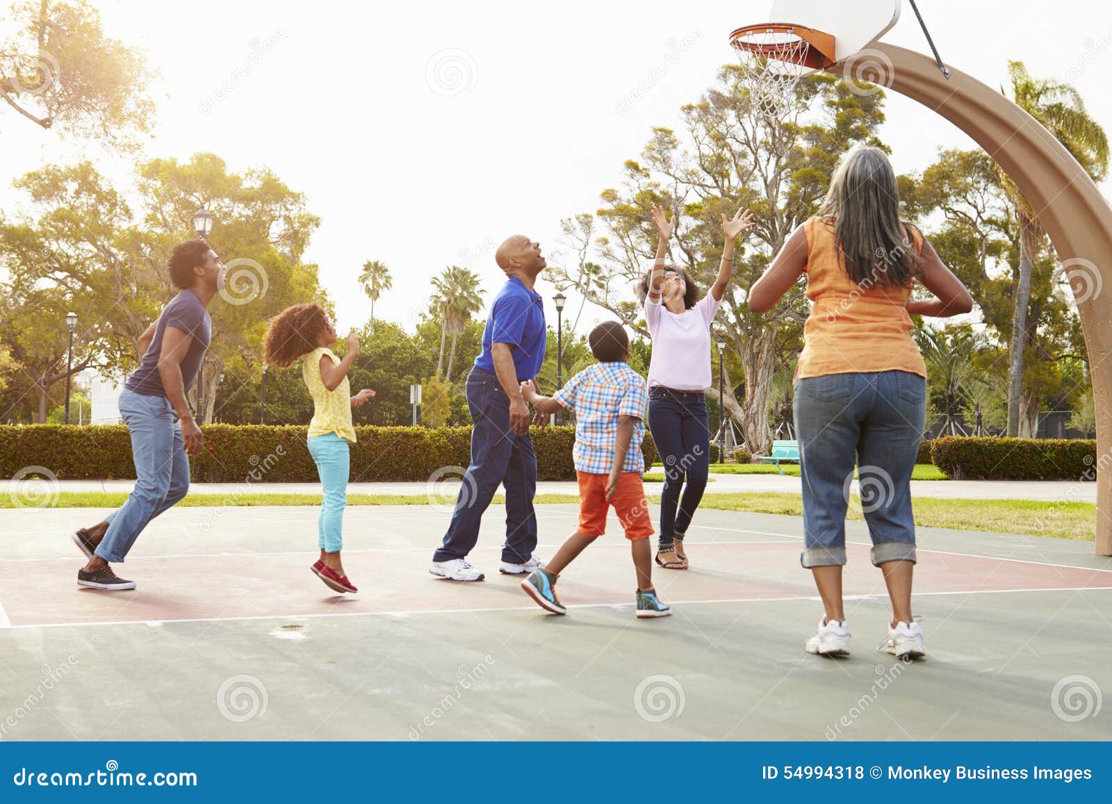 Multi Generation Family Playing Basketball Together Stock Photo - Image ...