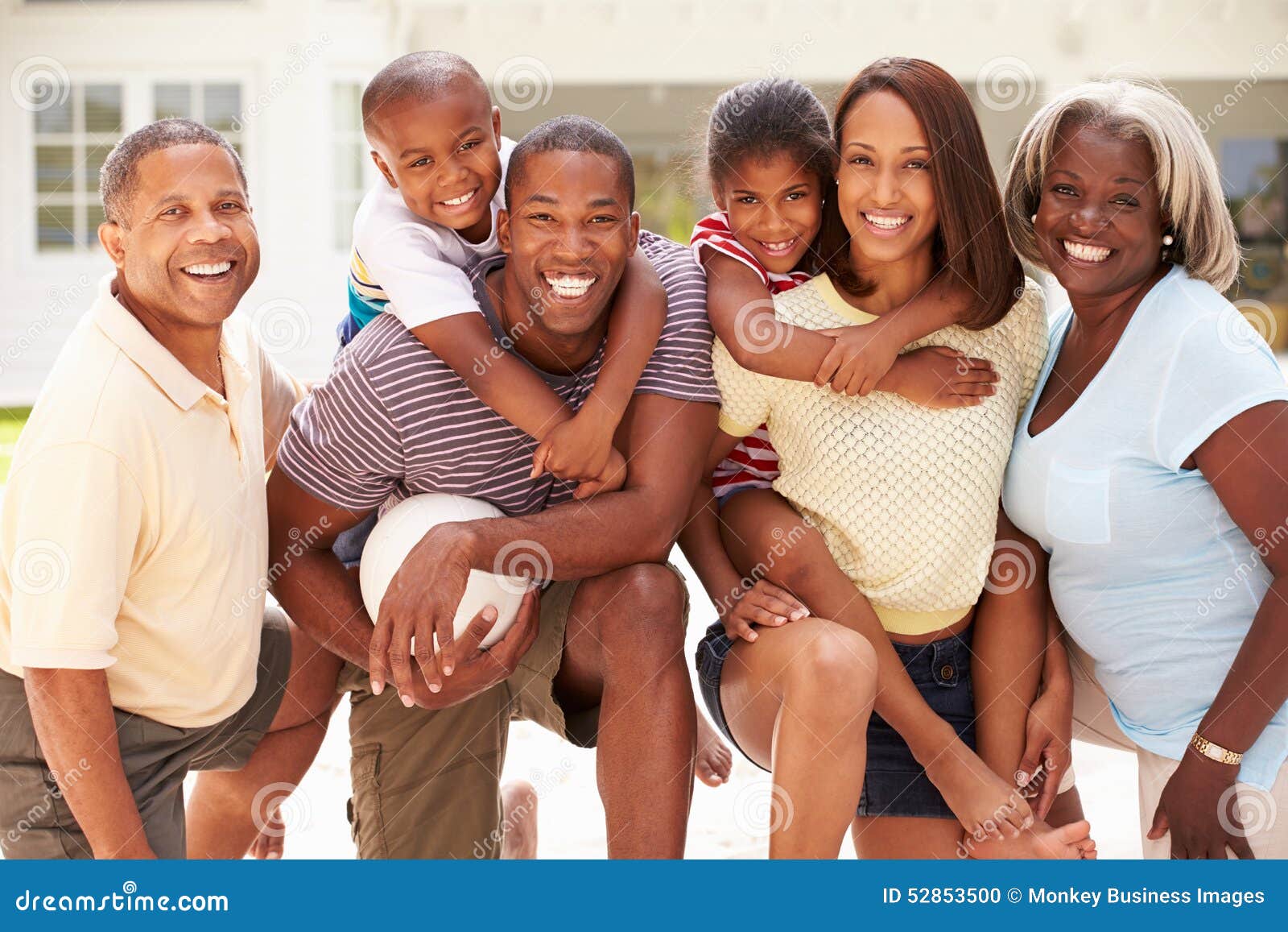 Multi Generation Family Playing Volleyball Together Stock Photo - Image ...
