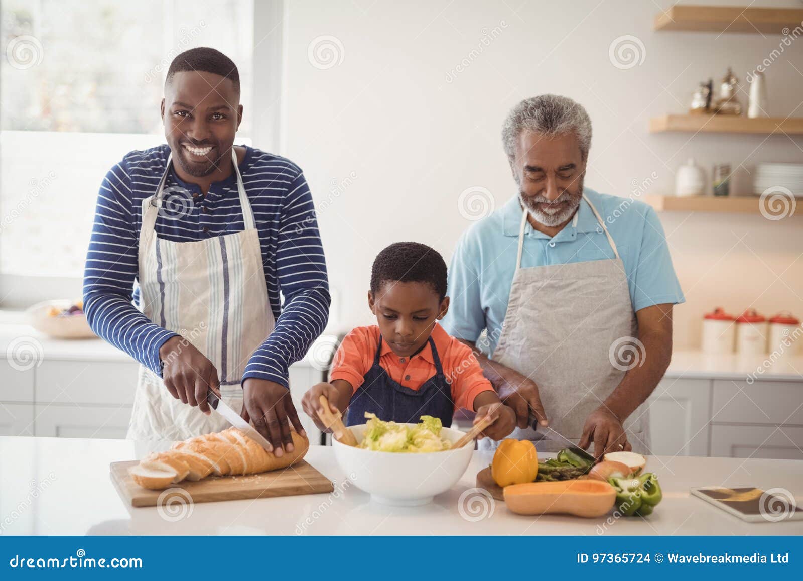 Multi-generation Family Preparing Food in Kitchen Stock Photo - Image ...