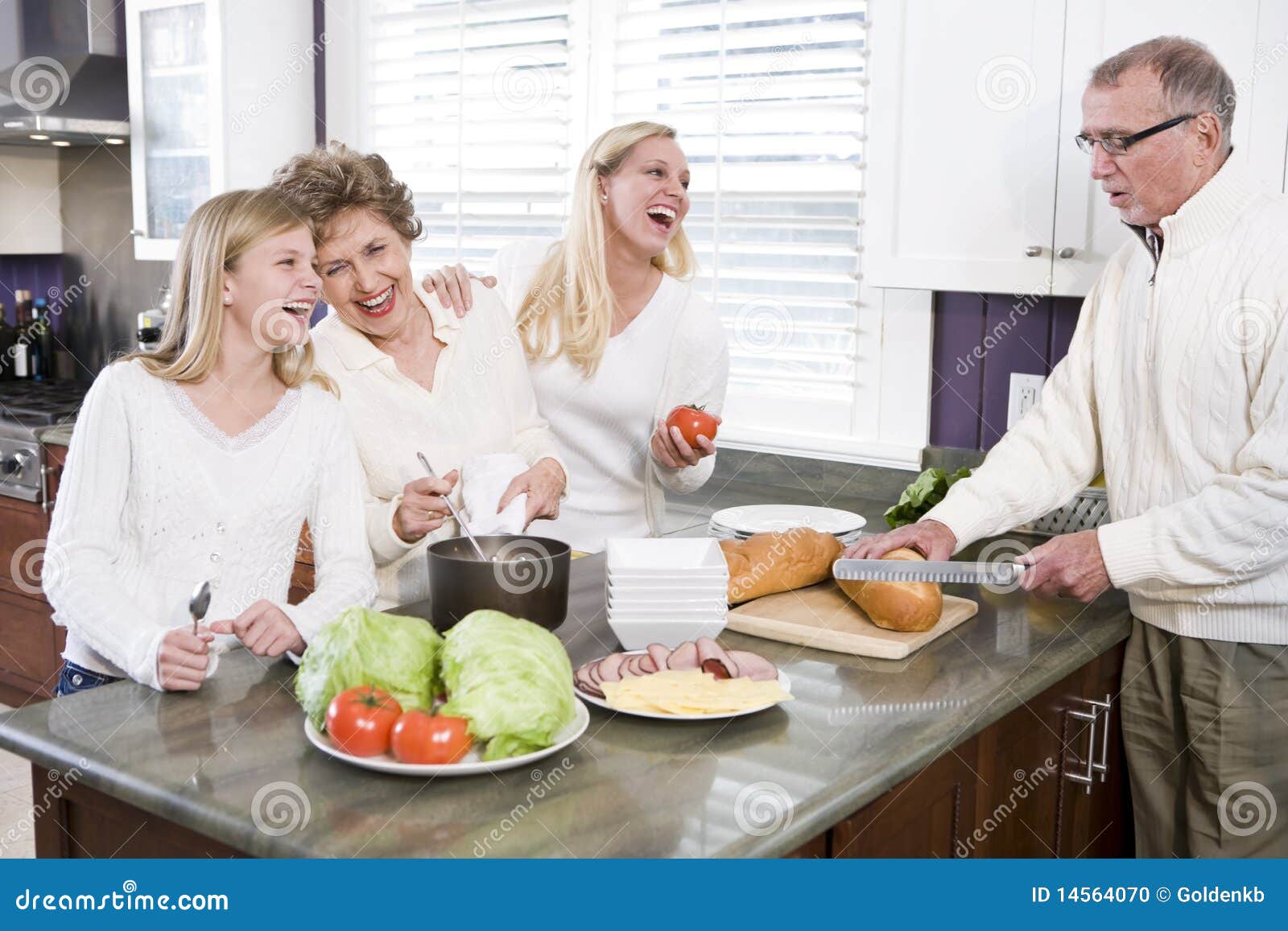 Multi-generational Family Making Lunch in Kitchen Stock Photo - Image ...