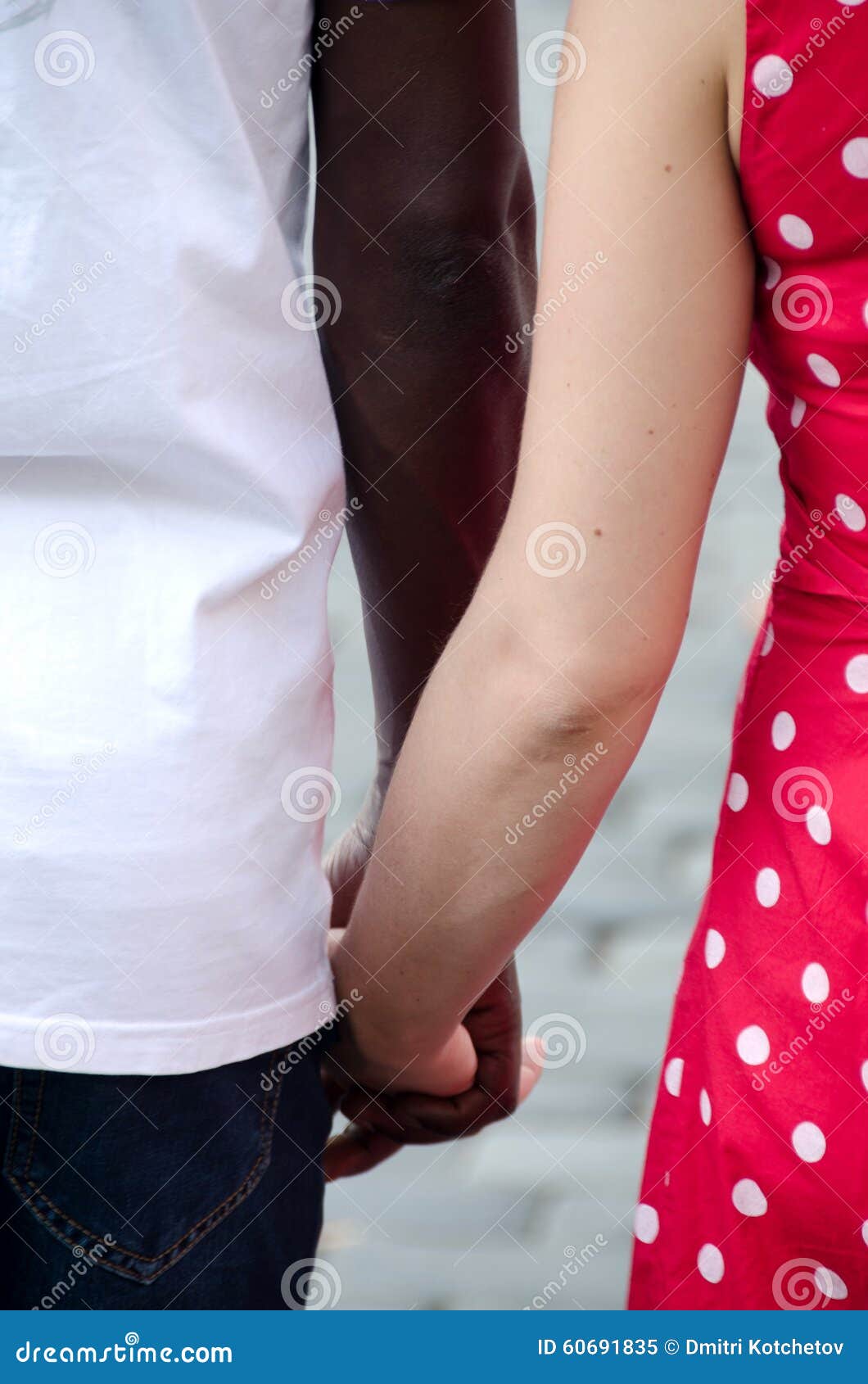 Multi Race Young Couple in Holding Hands in Old Town Stock Image ...