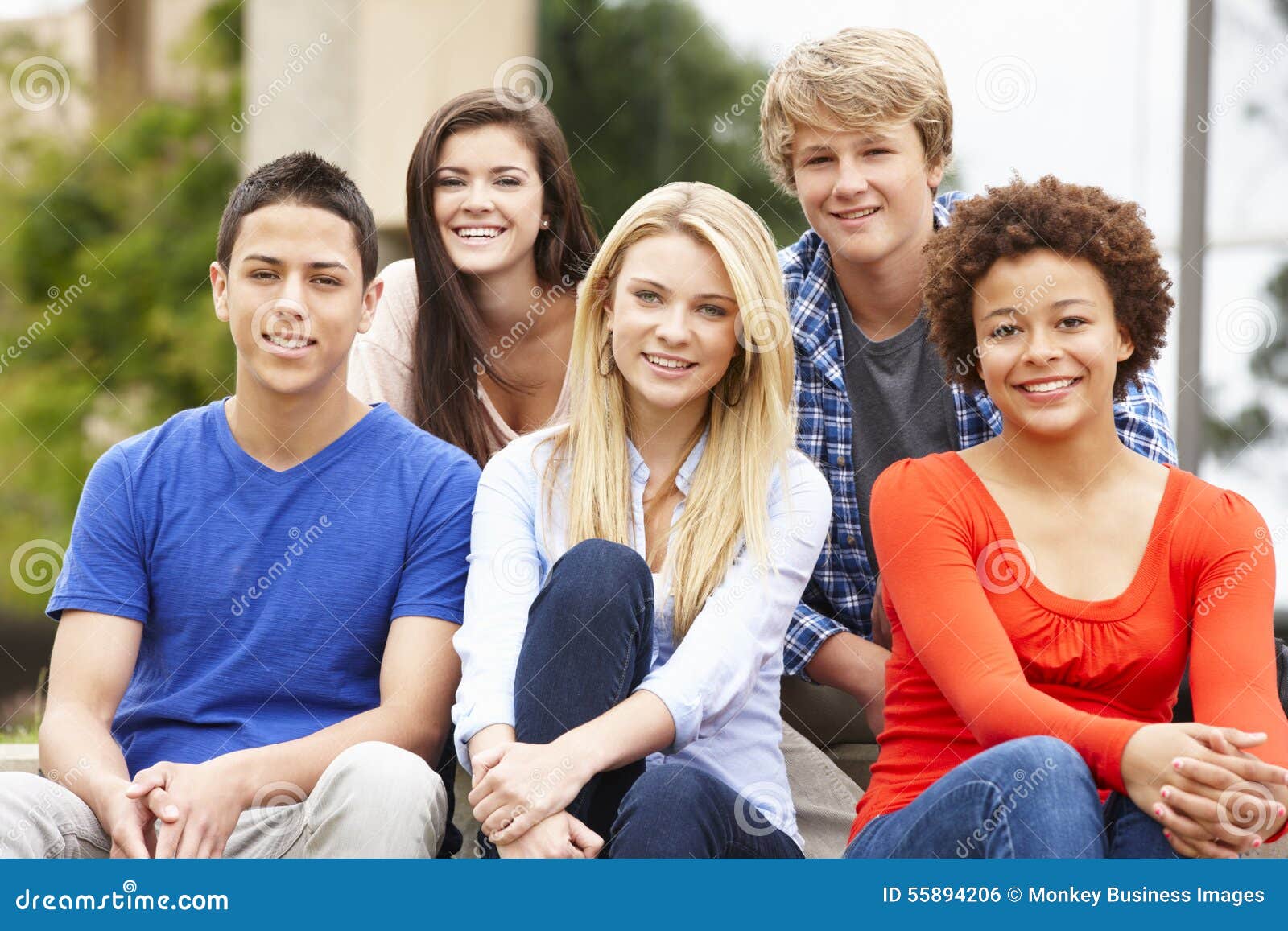 Multi Racial Student Group Sitting Outdoors Stock Photo - Image of ...