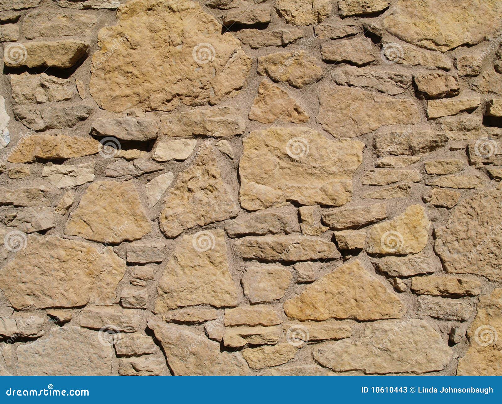 Multi-Sized Tan Stone Wall stock image. Image of masonry - 10610443