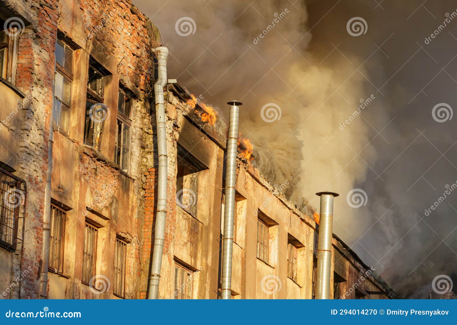 The Multi-storey Abandoned Building is Completely Engulfed in Fire and ...