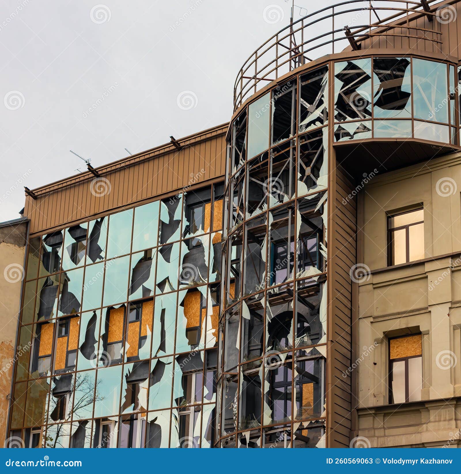 Multi-storey Building with a Damaged Facade and Broken Glass in the ...